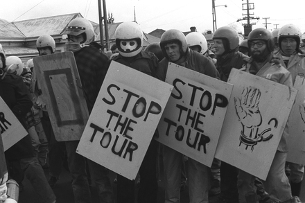 Protestors in helmets and with placards, Eden Park. Anti Springbok Tour ...